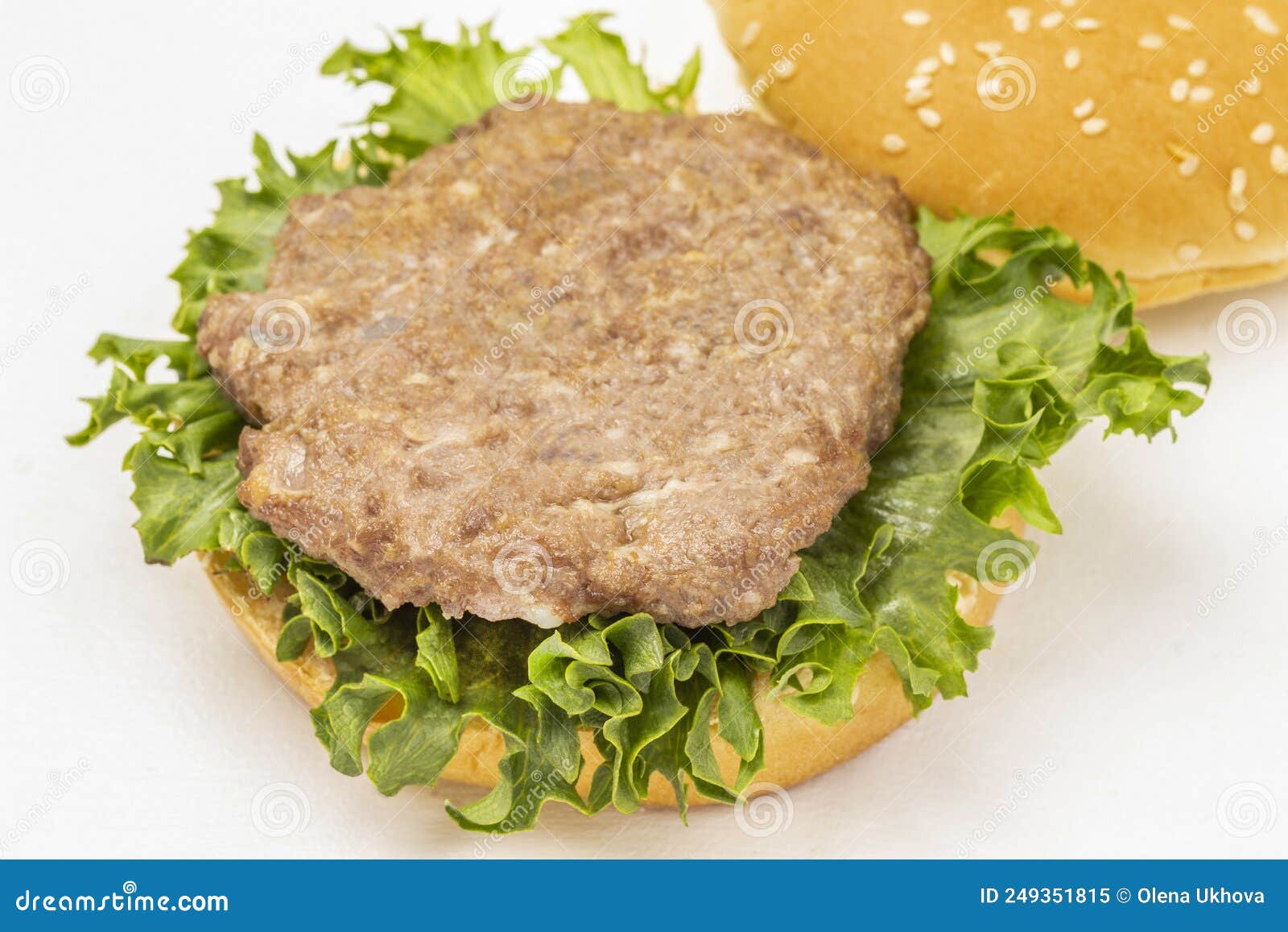Fried Burger Bun on Lettuce Leaf. Top View Stock Image - Image of knife ...