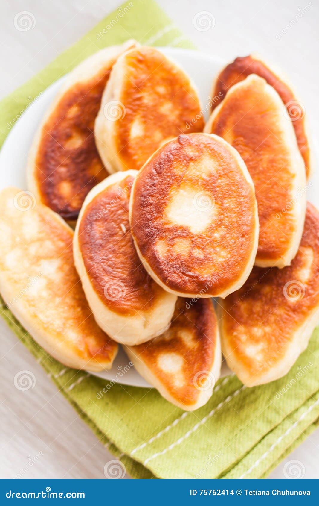 Fried Cakes with Jam on a Green Napkin Stock Photo - Image of group ...