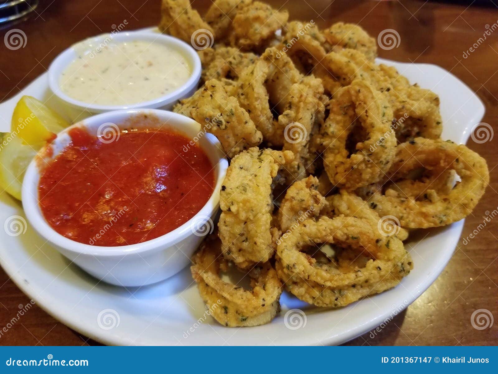 Fried Calamari As Appetizers with Dipping Red Sauce Stock Image - Image ...
