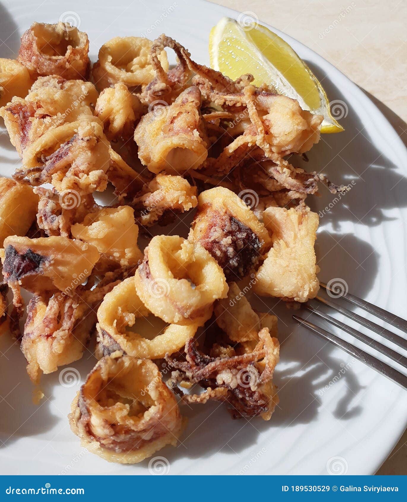 Fried Calamary and Mini Octopus in Dish on Cook Table Stock Image ...