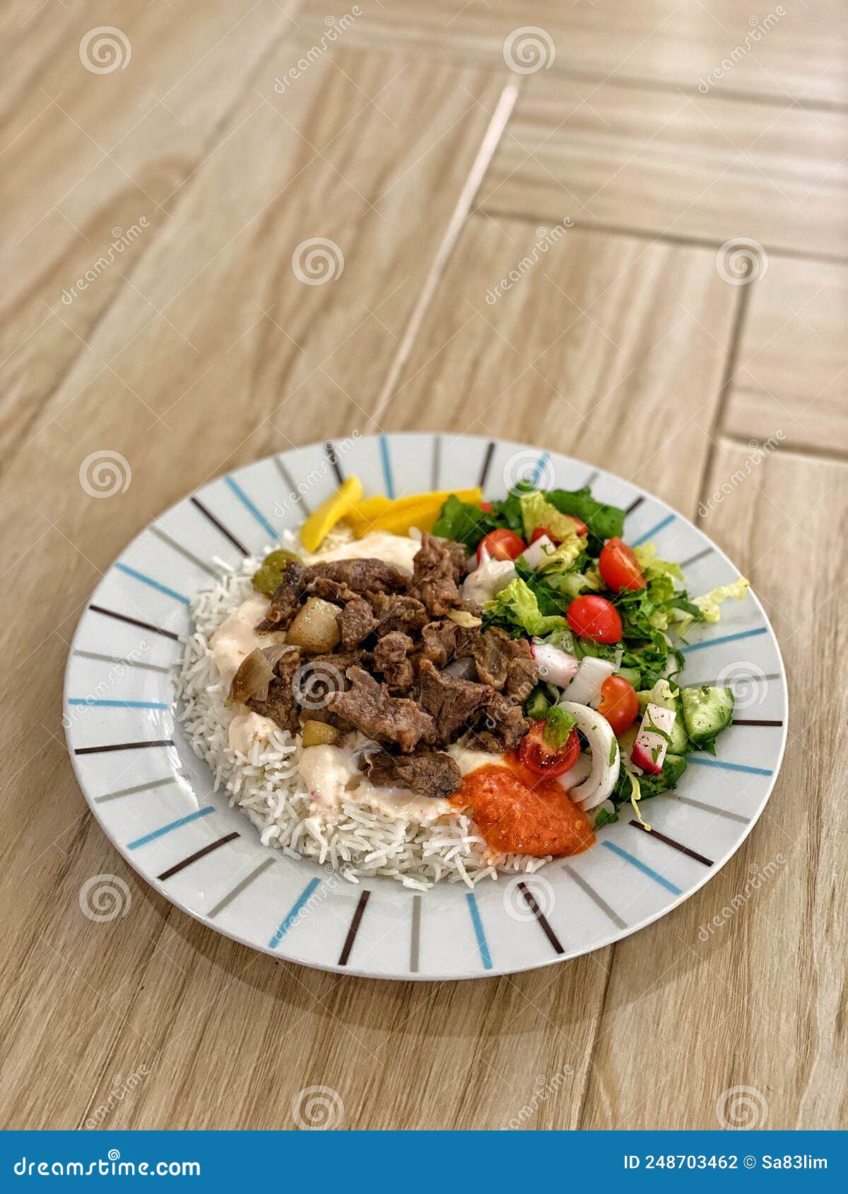 Fried Camel Meat with Rice and Salad Omani Cuisine Stock Photo - Image ...
