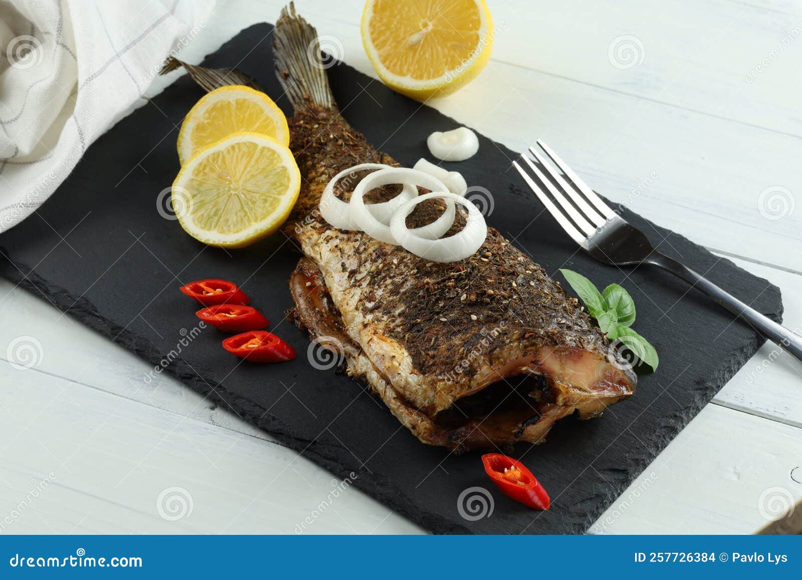 Fried Carp Fish with Vegetables, Tomatoes and Lemon. Delicious Fried ...