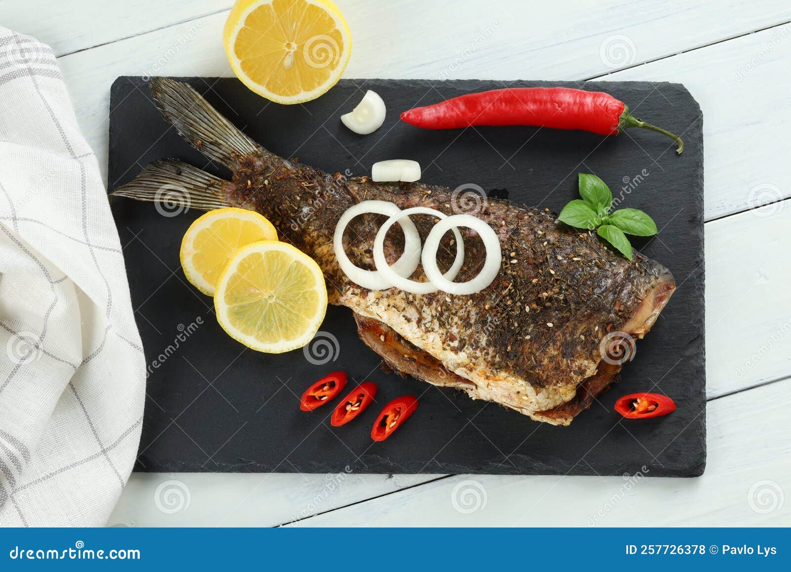 Fried Carp Fish with Vegetables, Tomatoes and Lemon. Grilled Fish Carp ...