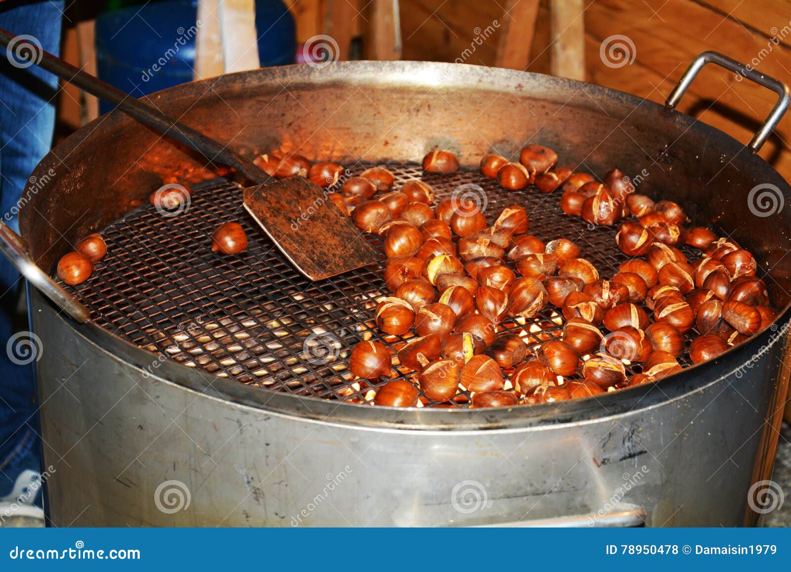 Fried chestnuts and fire stock photo. Image of cooking - 78950478