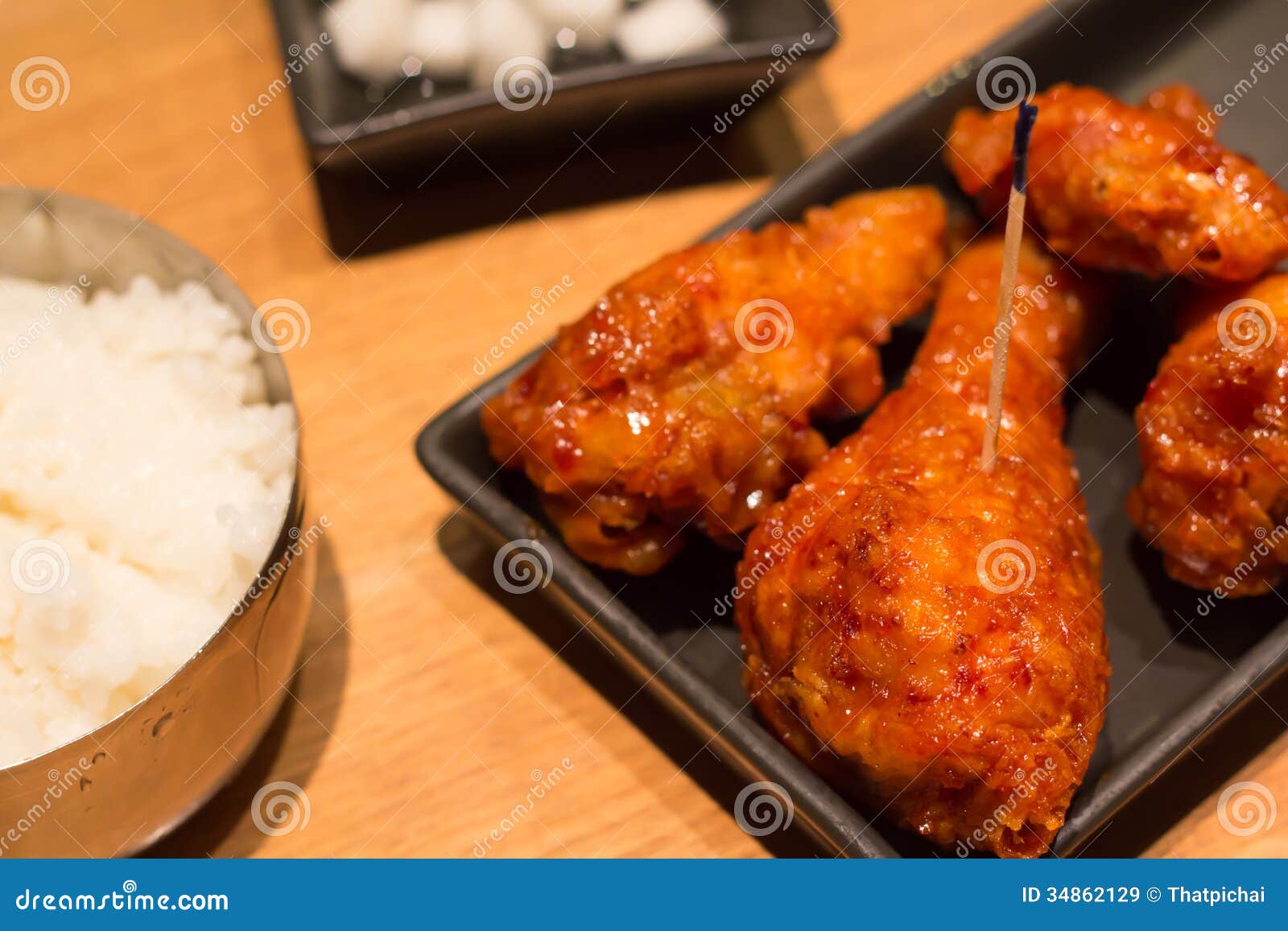 Fried Chicken on a Black Plate with Rice Stock Image - Image of thigh ...