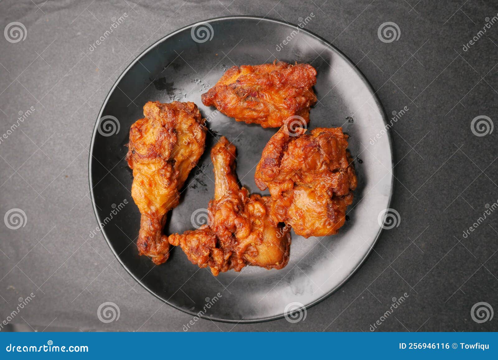 Fried Chicken Fillets on Plate on Black Background Stock Photo - Image ...