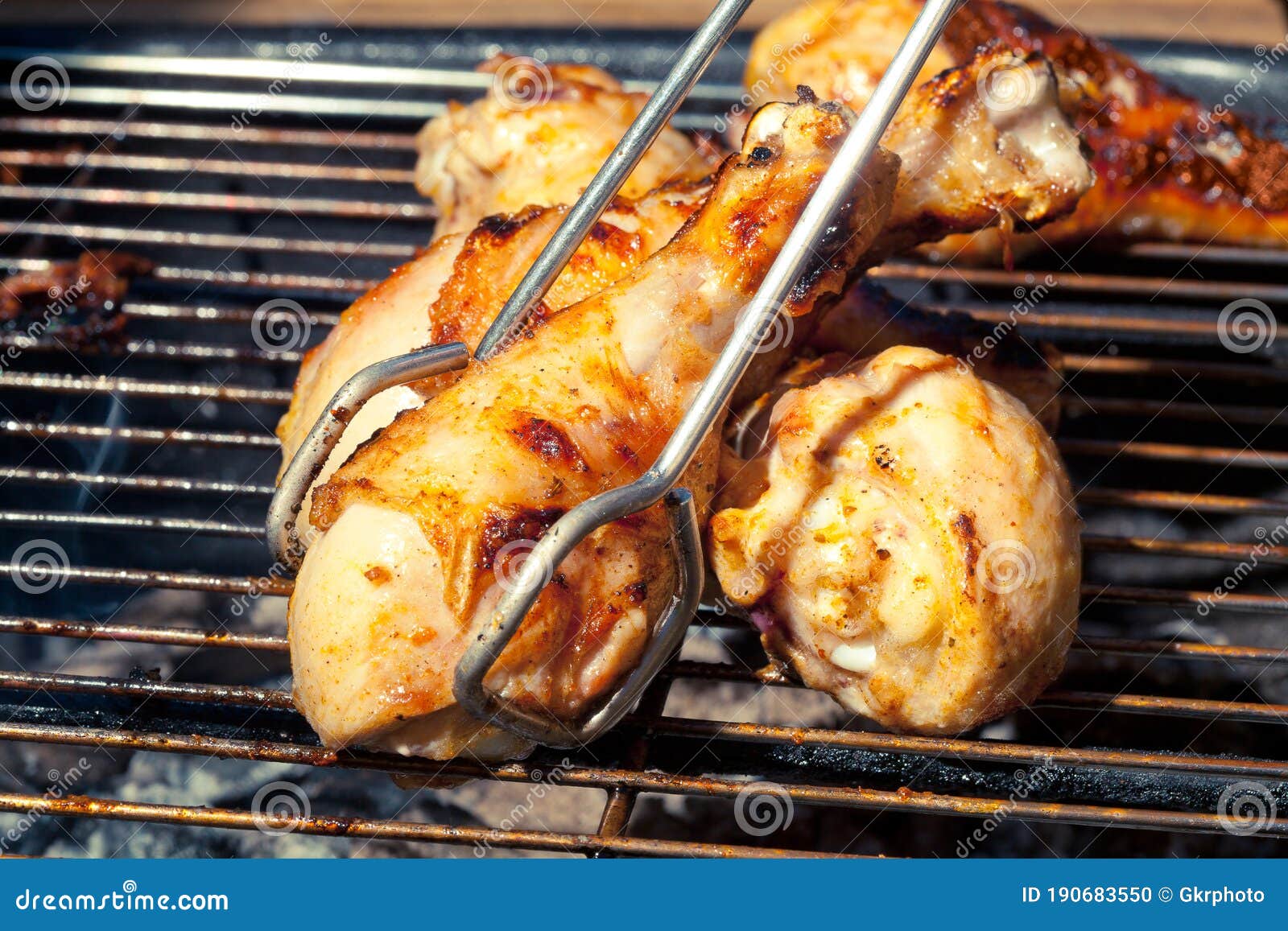 Fried chicken on the grill stock photo. Image of grate - 190683550