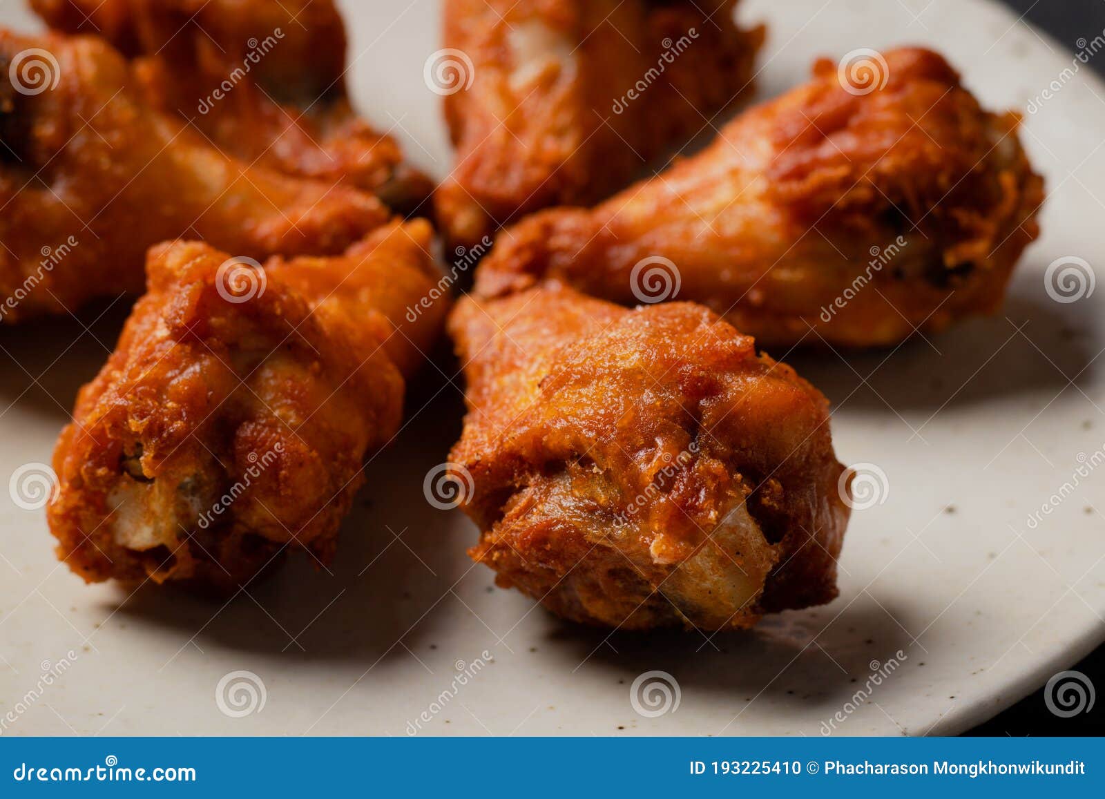 Fried Chicken Leg in a Plate Stock Photo - Image of lemon, food: 193225410