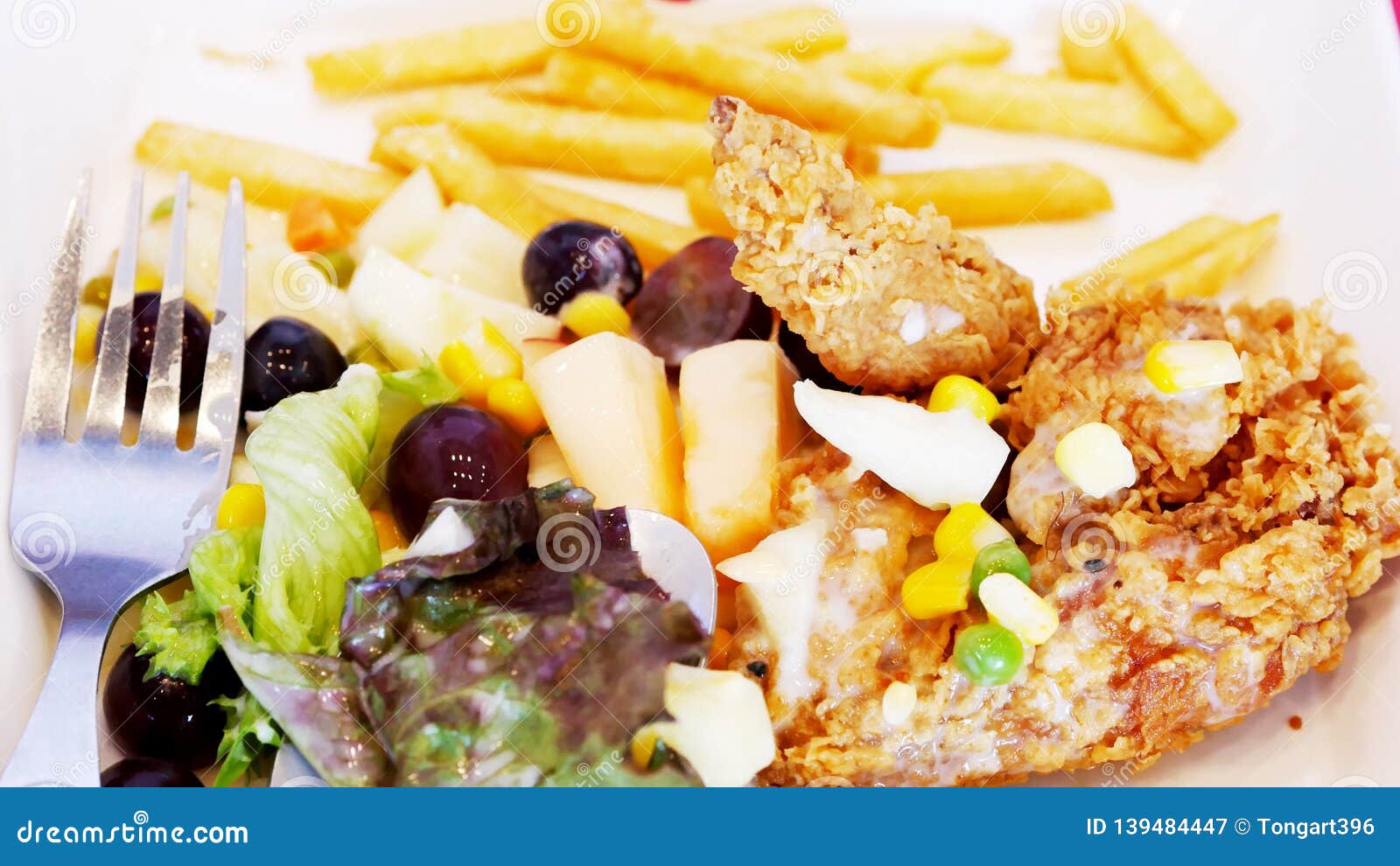 Fried Chicken Mixed with Fruit Salad Stock Image - Image of floor ...