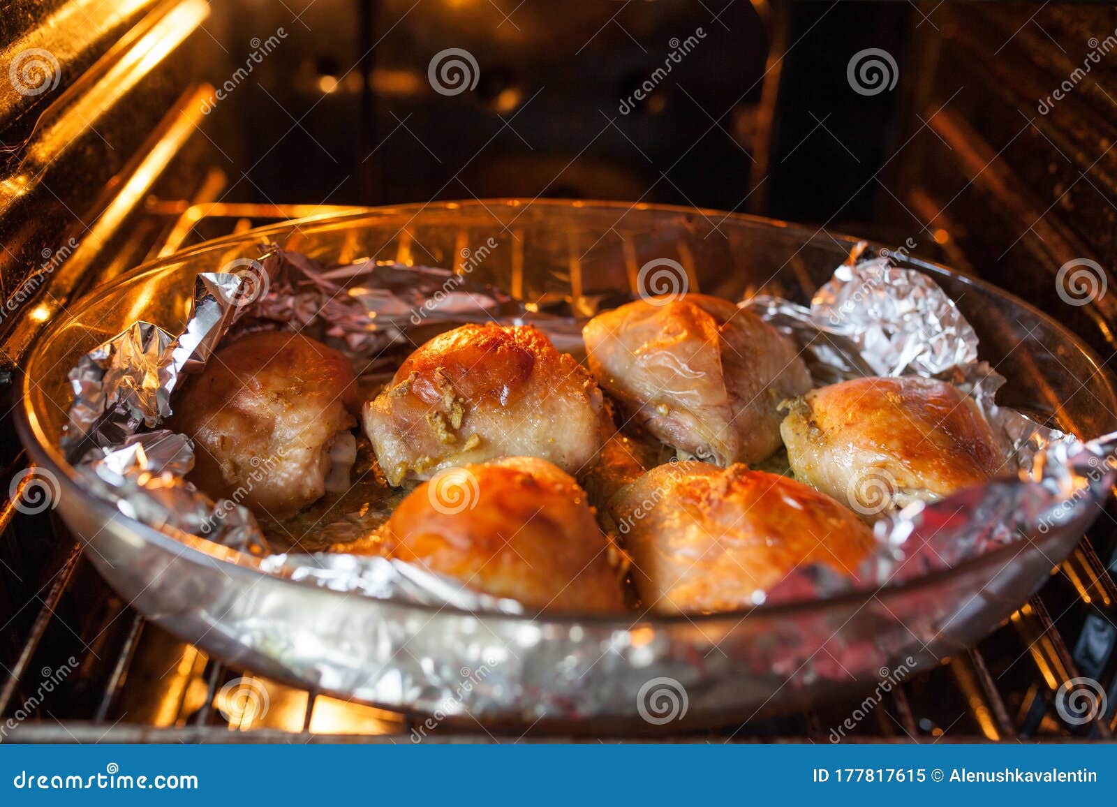 Fried chicken at open oven stock image. Image of wings - 177817615