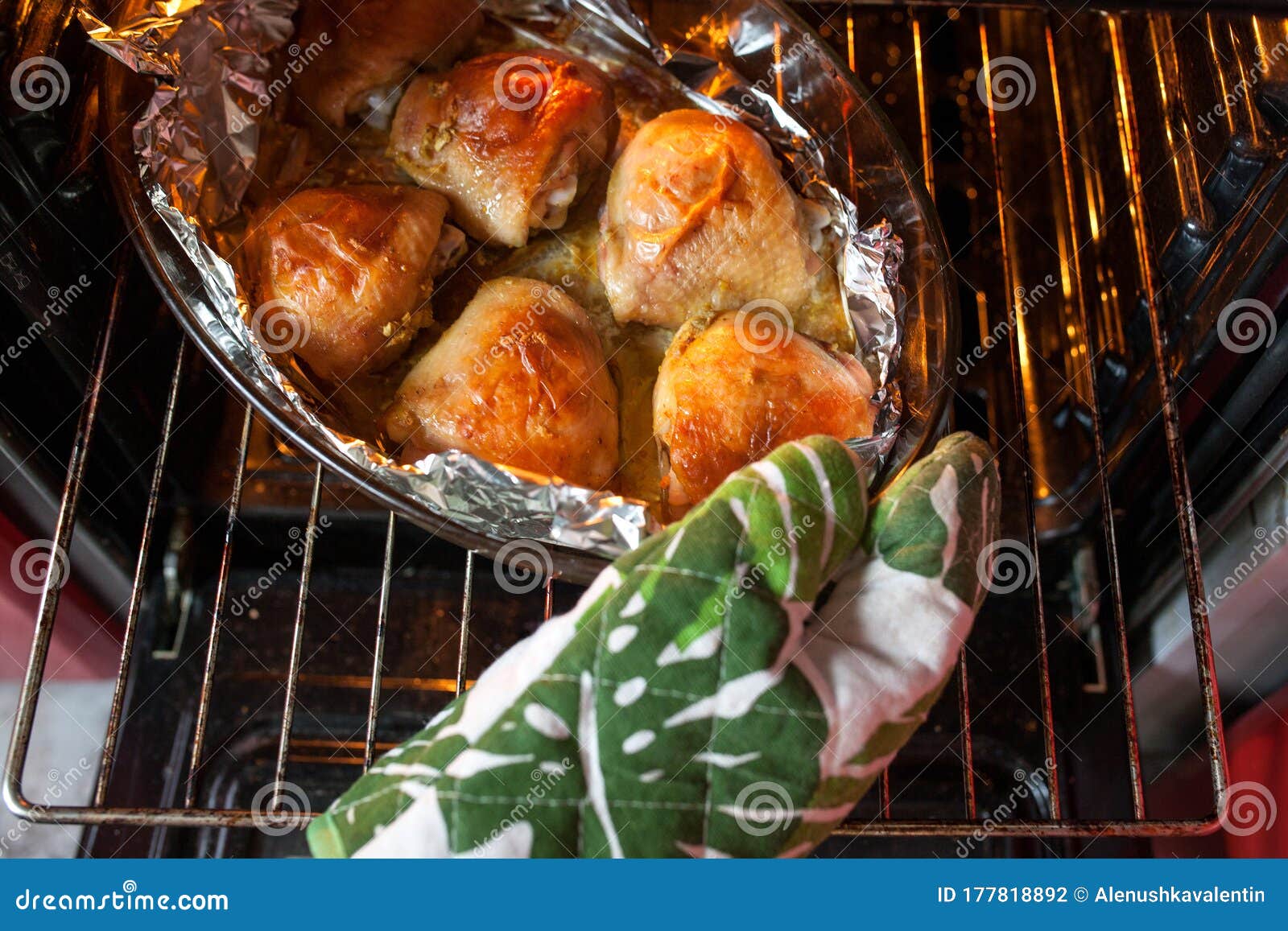 Fried chicken at open oven stock photo. Image of food - 177818892