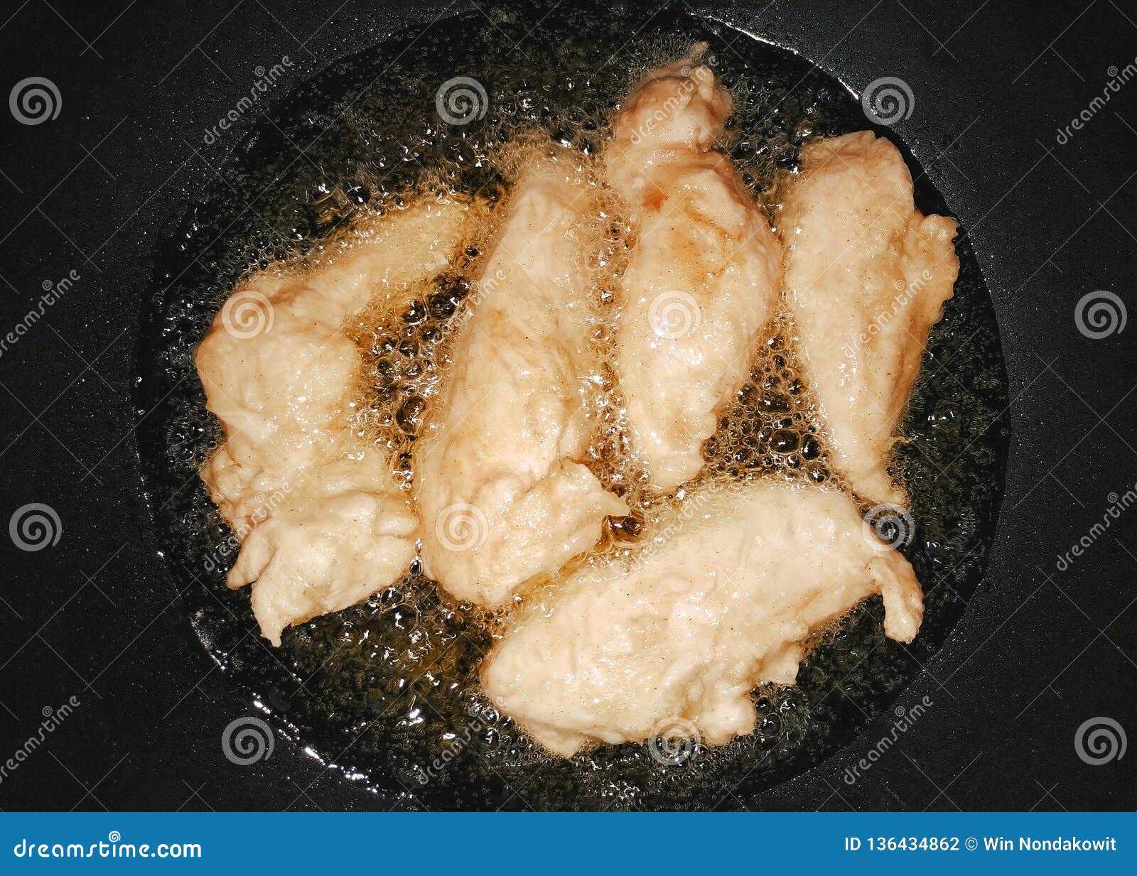 Fried Chicken with Palm Oil Stock Photo - Image of fried, boiling ...