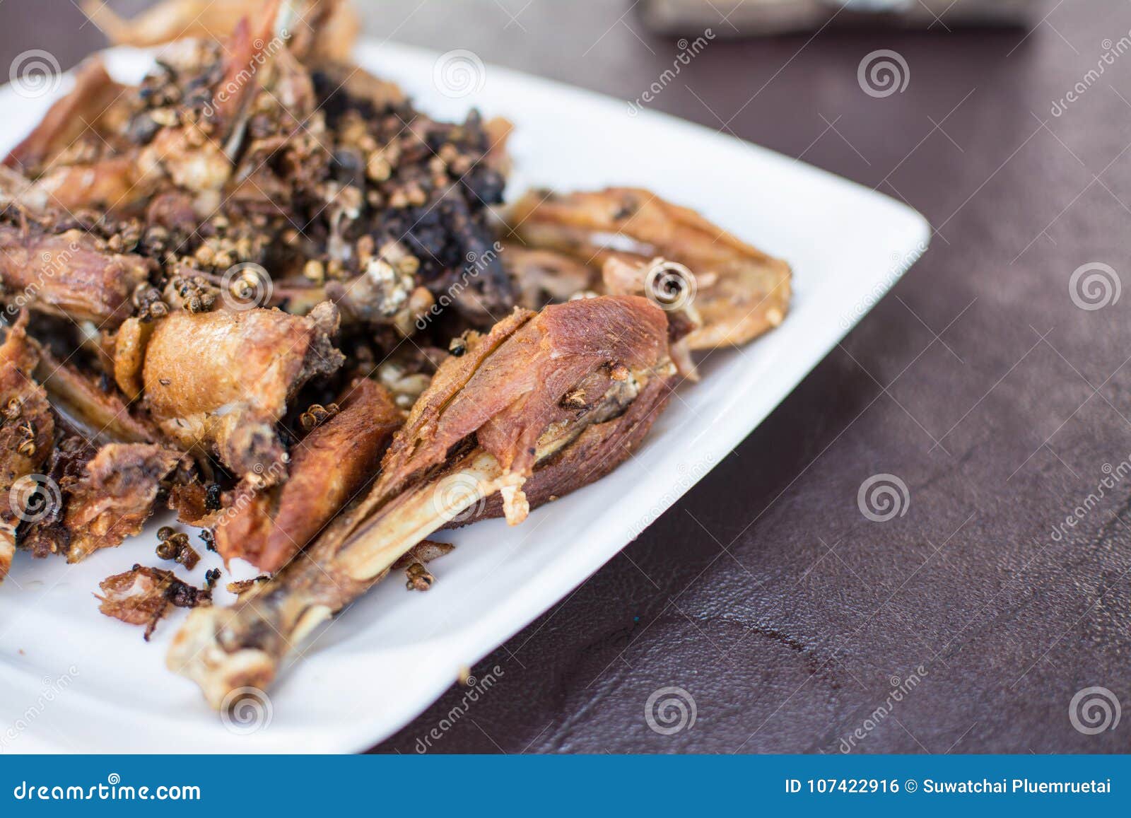 Fried chicken with pepper stock photo. Image of roasted - 107422916