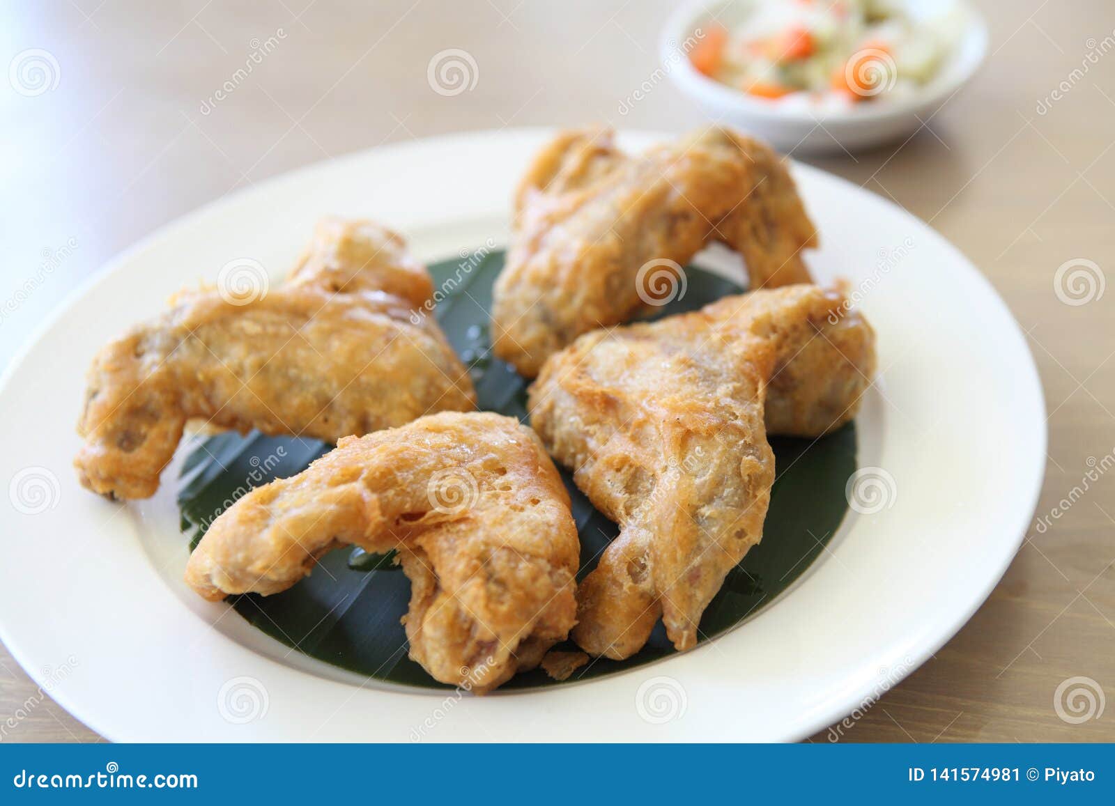Fried chicken on a plate stock image. Image of delicious - 141574981