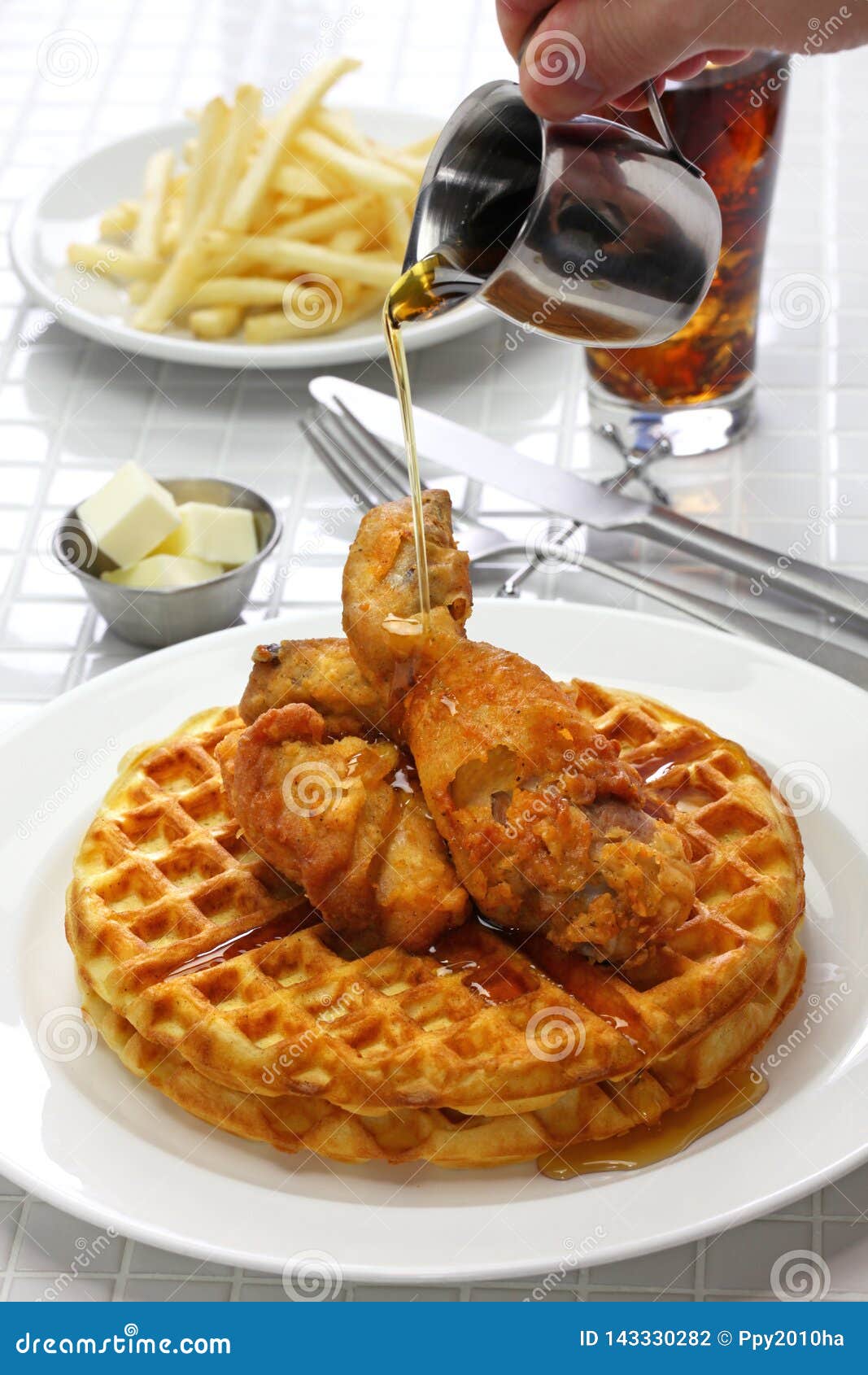 Fried Chicken and Waffles with Maple Syrup Stock Photo - Image of plate ...