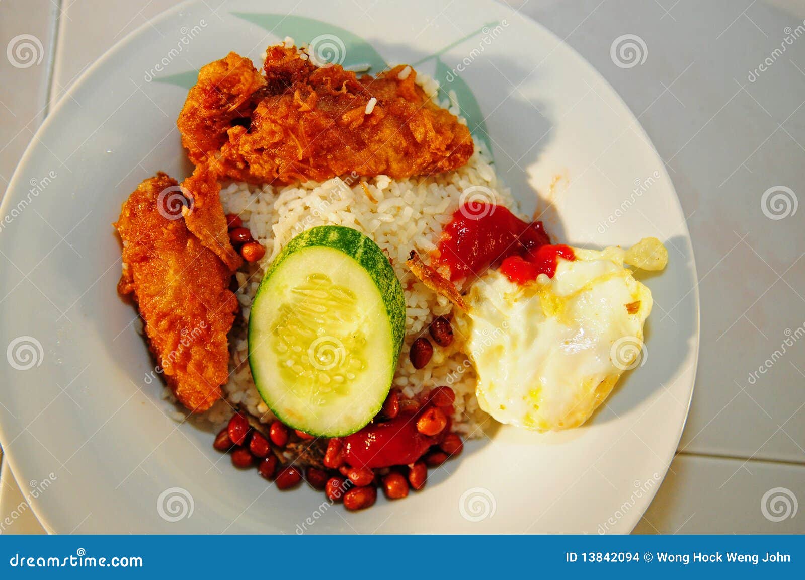 Fried Chicken Wing, Rice, Cucumber and Eggs Stock Photo - Image of ...