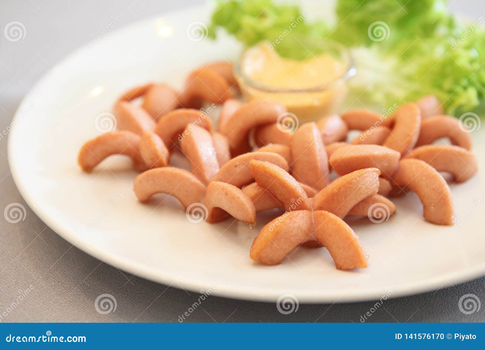 Fried cocktail sausages stock photo. Image of decoration - 141576170