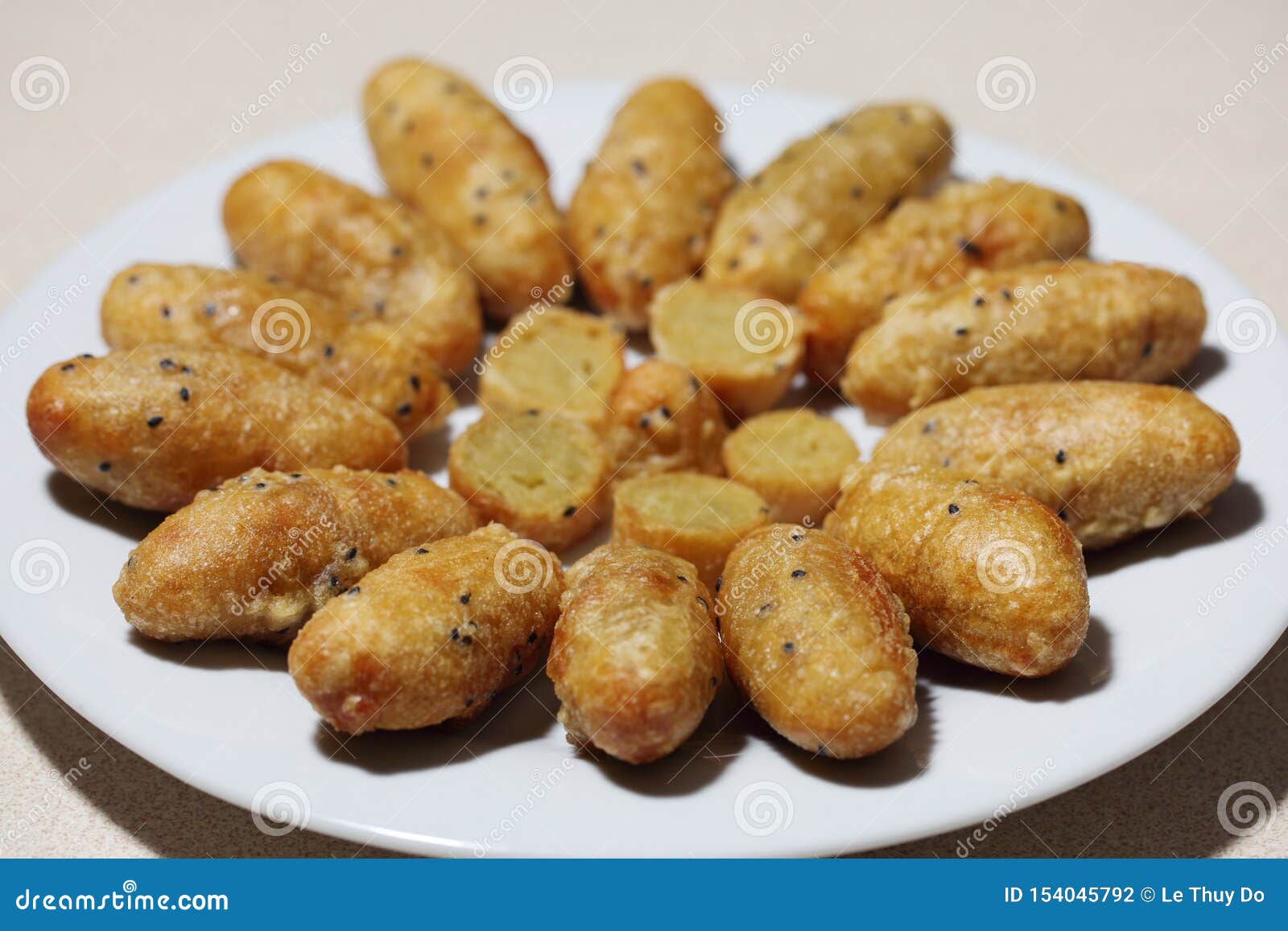 Fried Cocoon Sweet Potato stock photo. Image of street - 154045792