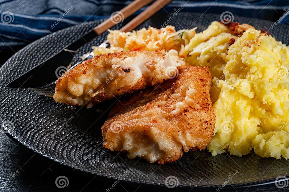 Fried cod fillet served stock photo. Image of lunch - 349692548