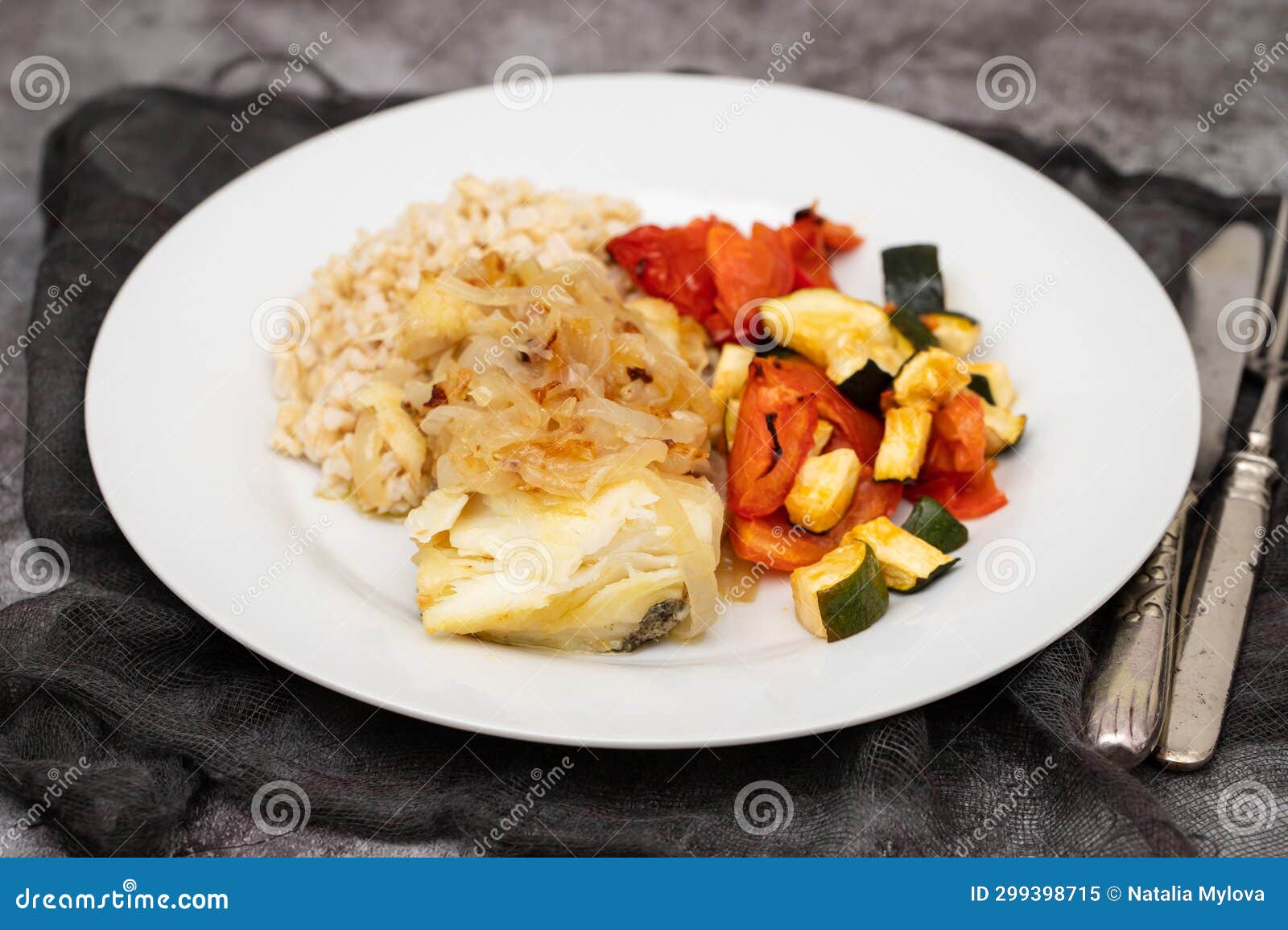 Fried Cod Fish with Onion, Vegetables, Rice and Olive Oil on Plate ...