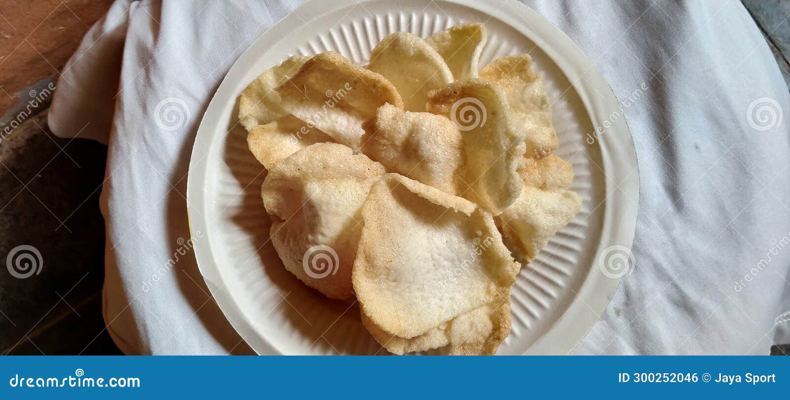 Fried Crackers Placed on a White Plastic Plate Stock Photo - Image of ...