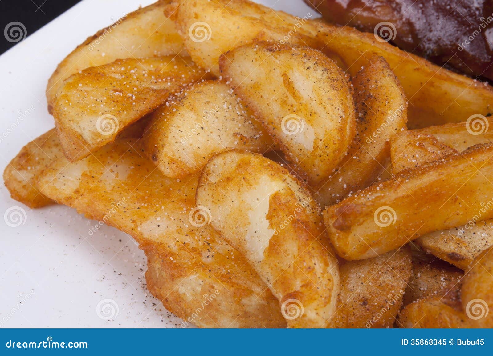 Fried Crisp Potato Wedges D'or. Image stock - Image du frit, côté: 35868345
