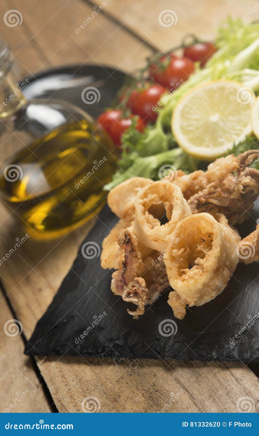 Fried Crispy Calamari Served on Plate Stock Photo - Image of lemon ...