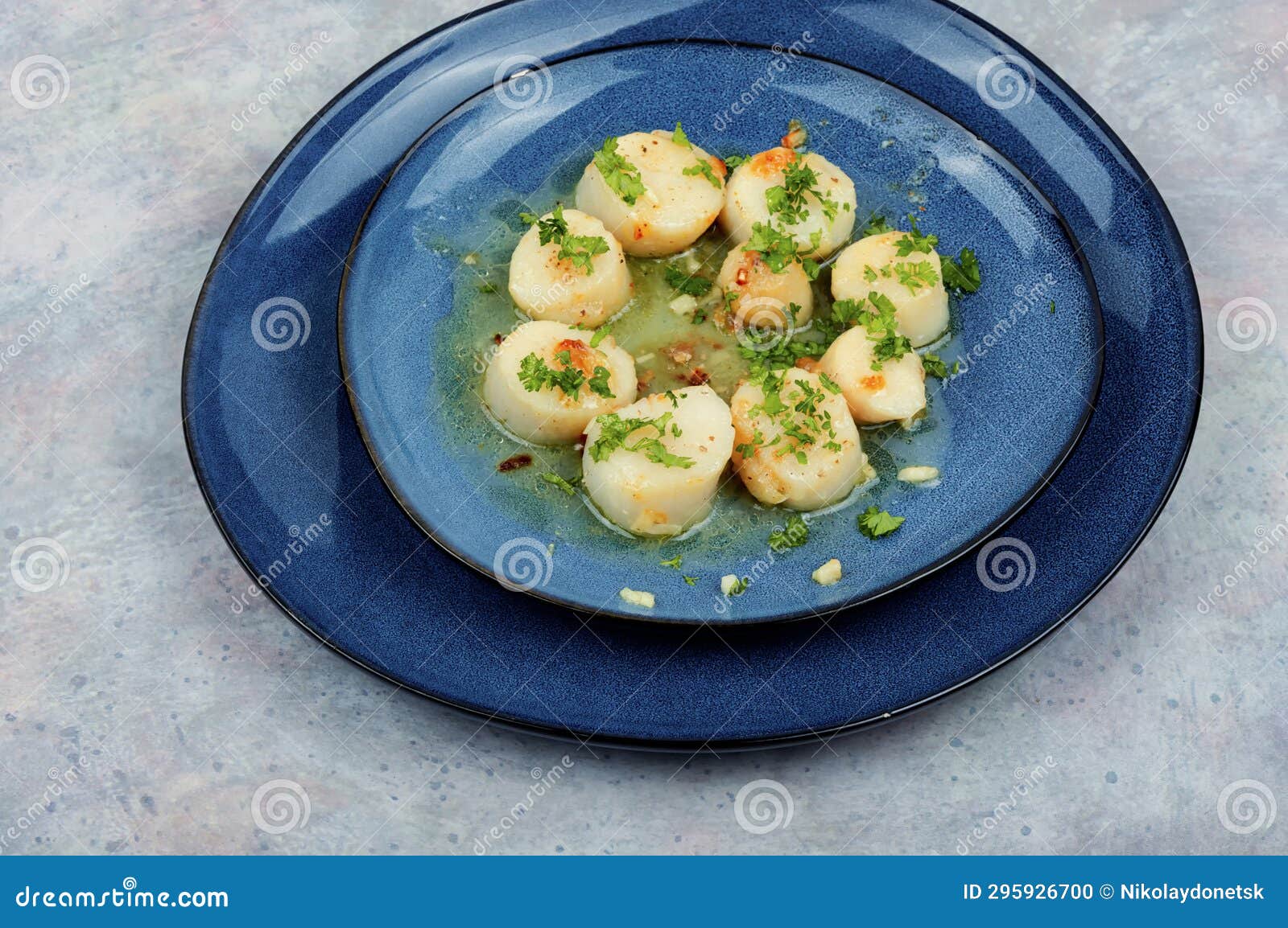 Seared scallops on a plate stock photo. Image of appetizer - 295926700