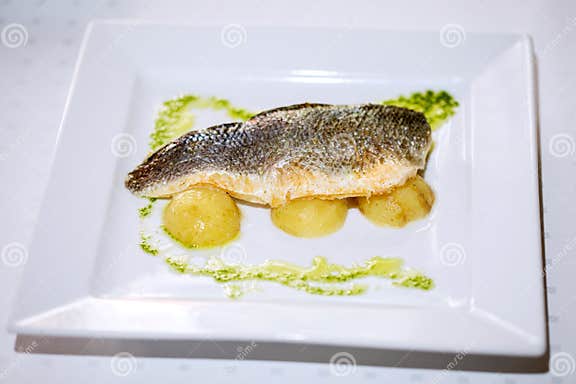 Fried Dorada Fillet with Egg, Chives and Thyme Stock Image - Image of ...