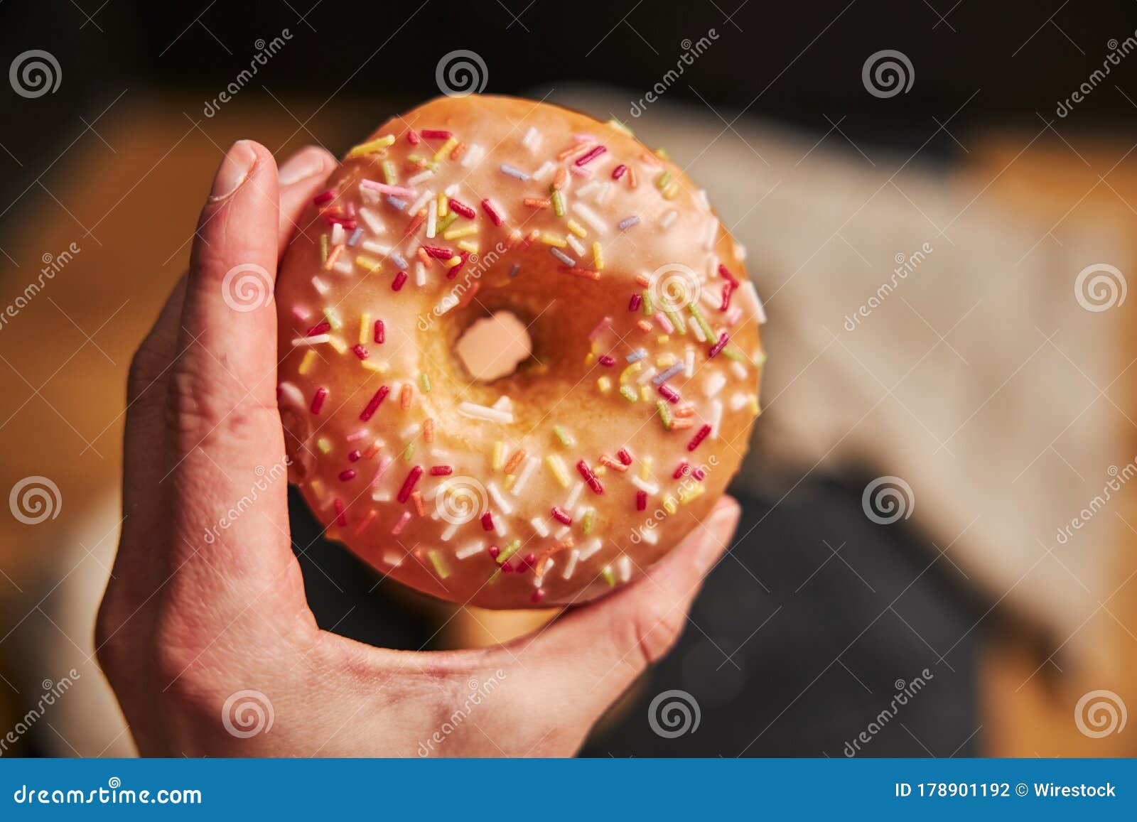 Fried Doughnut in a Person S Hands Stock Photo - Image of icing ...