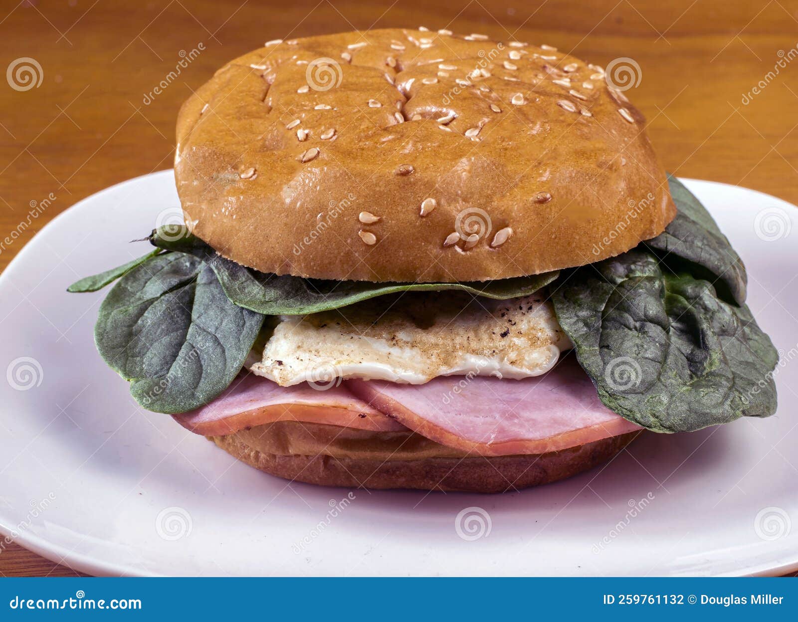 Fried Egg on Canadian Bacon with Spinach Stock Photo - Image of bacon ...