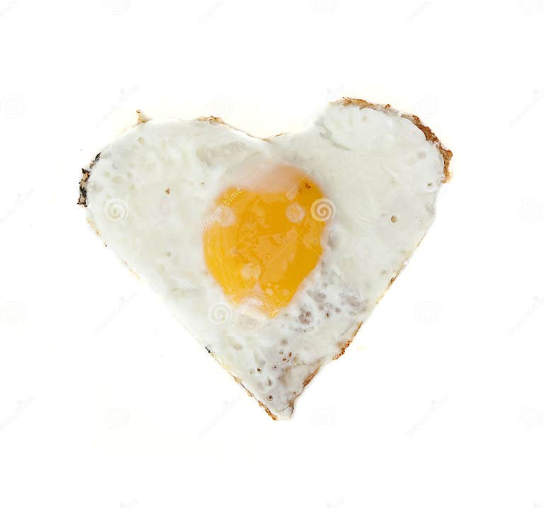 Fried egg in heart shape stock image. Image of heart - 15547307