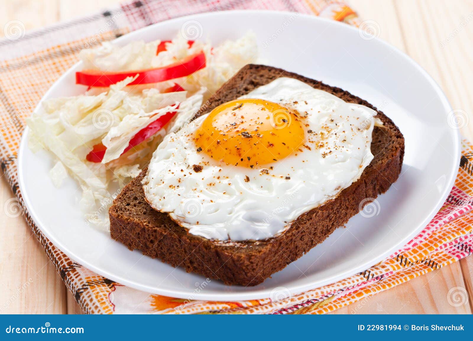 Fried egg on slice bread. stock photo. Image of protein - 22981994