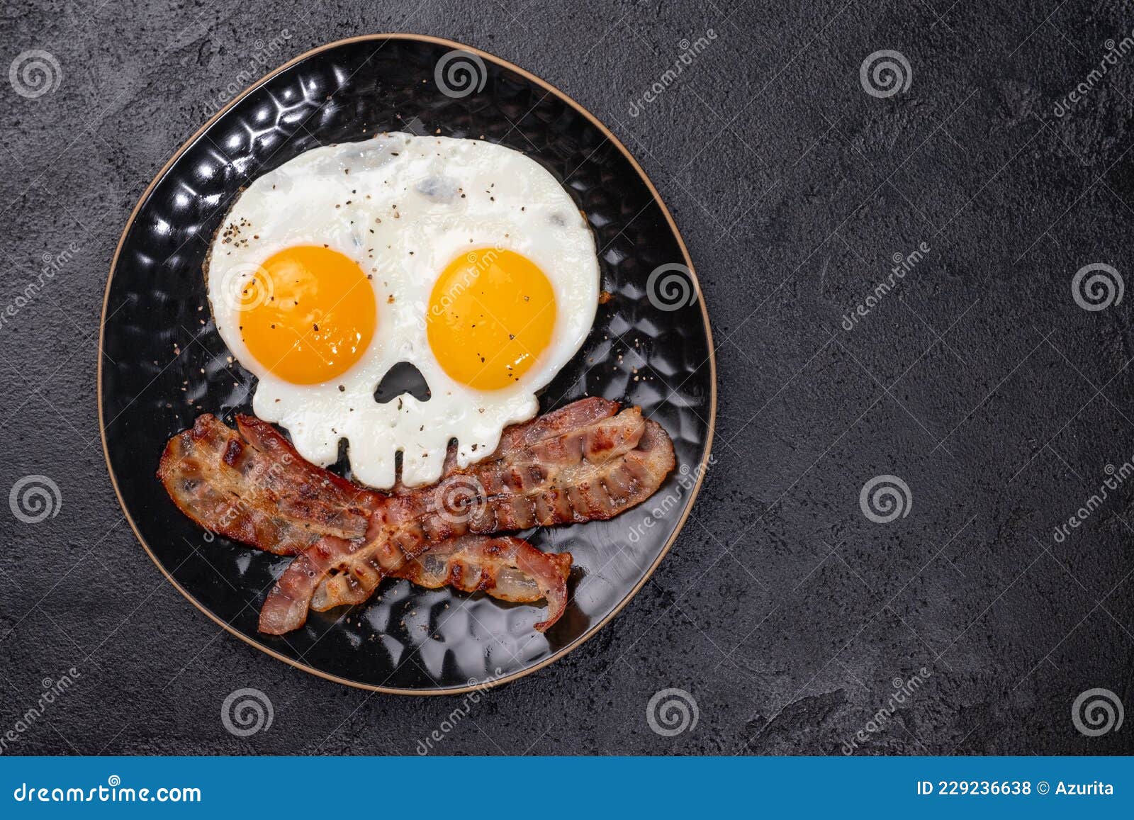 Fried Eggs with Bacon in the Shape of a Skull Stock Photo - Image of ...