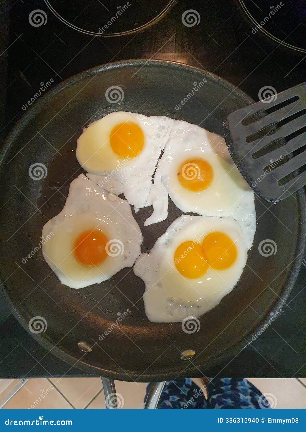 Fried eggs being cooked stock photo. Image of eggs, breakfast - 336315940
