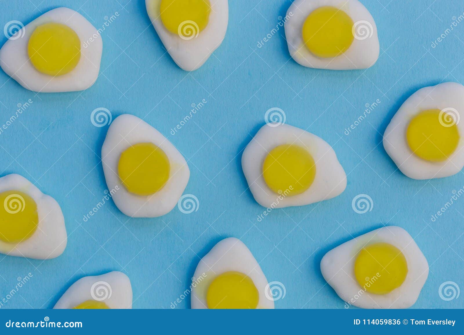 Fried Eggs Candy Sweets on Bright Blue Background Stock Photo - Image ...