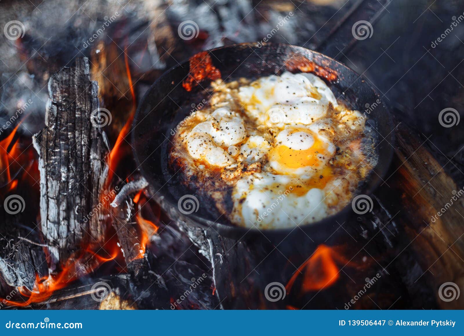 Fried Eggs on the Pan on the Fire in Winter Stock Image - Image of ...