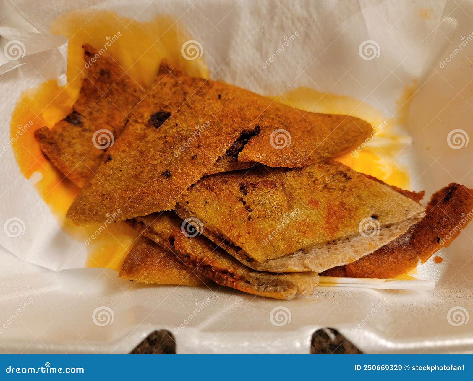 Fried Ethiopian Bread Called Injera with Spices in Container Stock ...