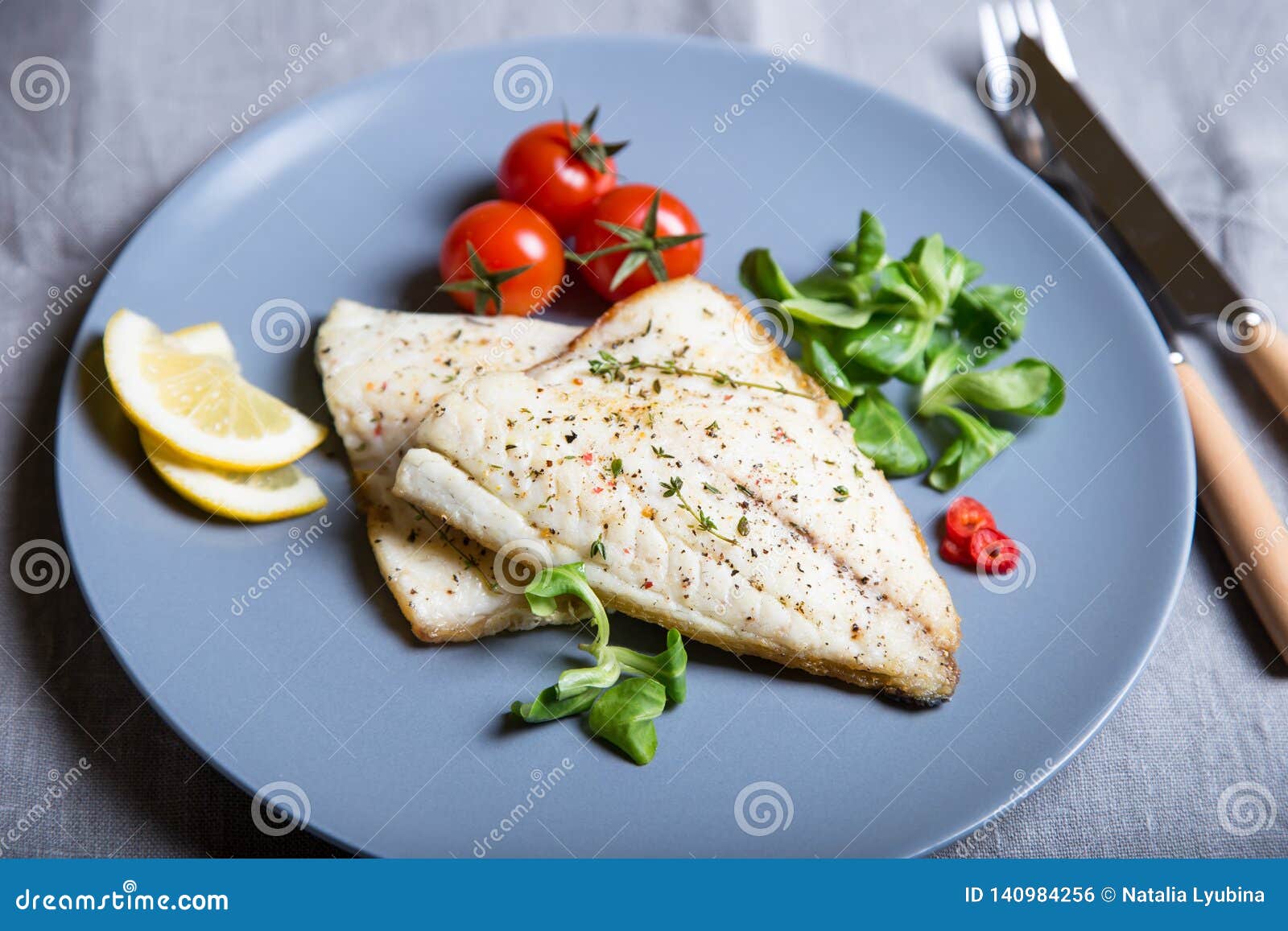 Fried Fillet Dorado Fish with Tomatoes, Lemon and Corn Salad Stock ...