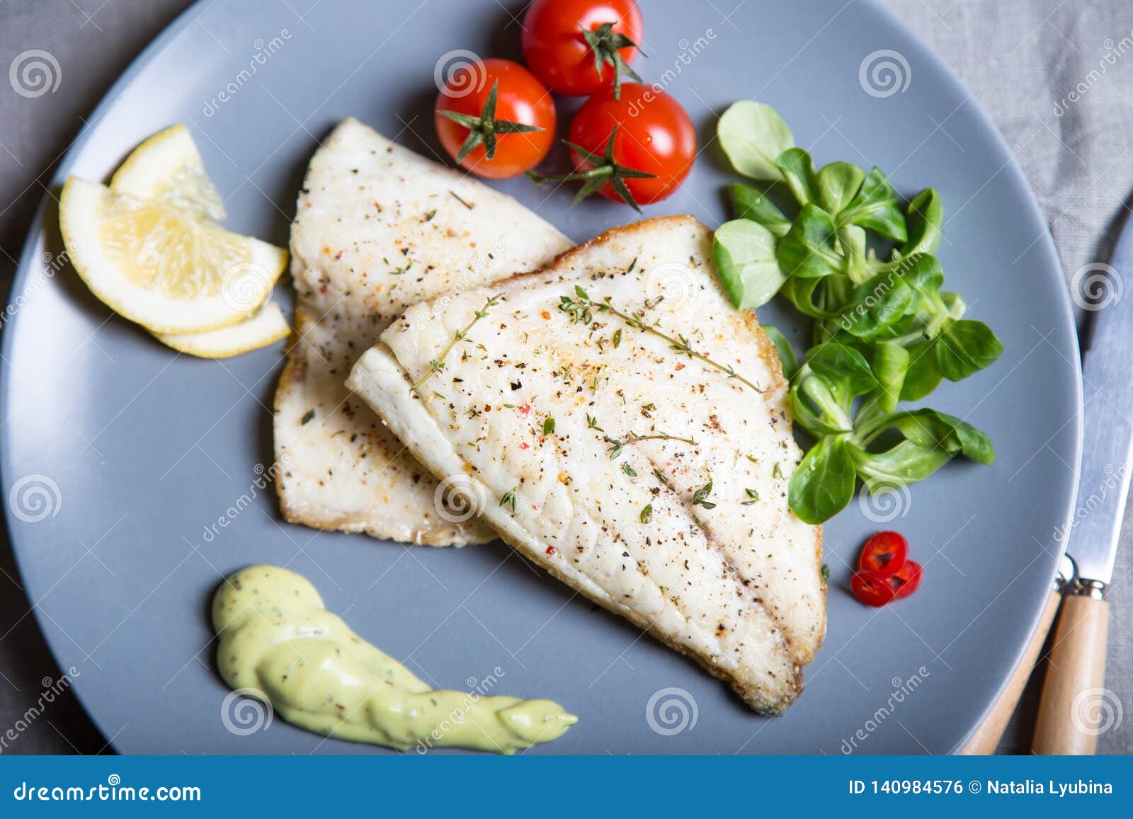 Fried Fillet Dorado Fish with Tomatoes, Lemon and Corn Salad Stock ...
