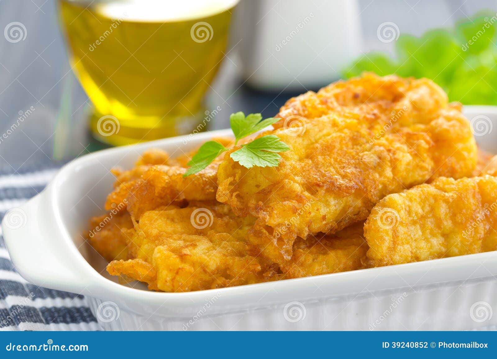Fried fish in a batter stock photo. Image of lunch, parsley - 39240852