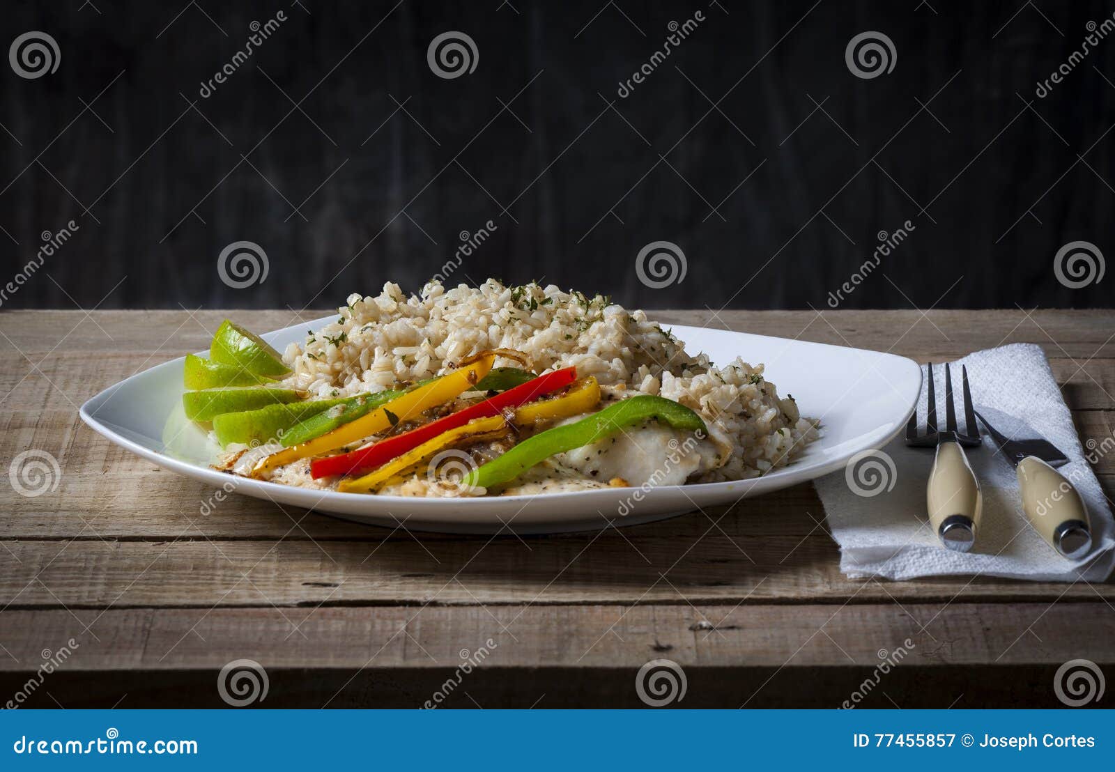 Fried fish with brown rice stock image. Image of brown - 77455857