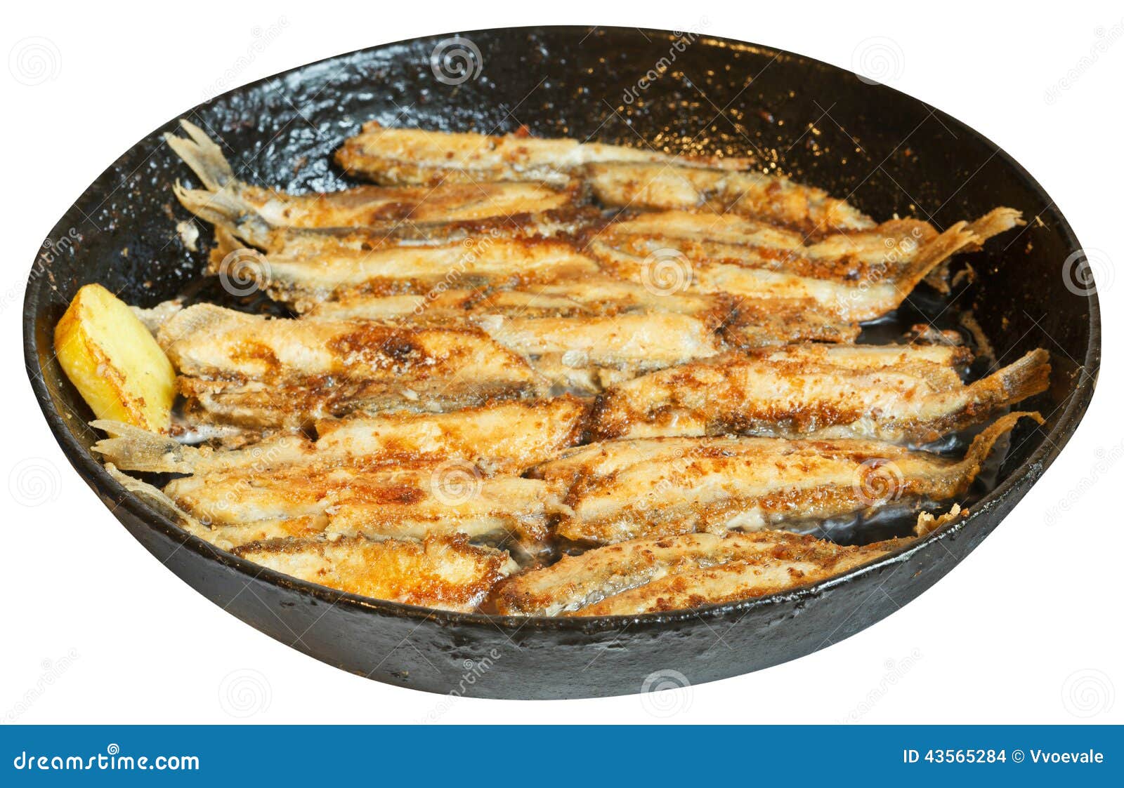Fried Fish Capelin on Black Frying Pan Isolated Stock Photo - Image of ...