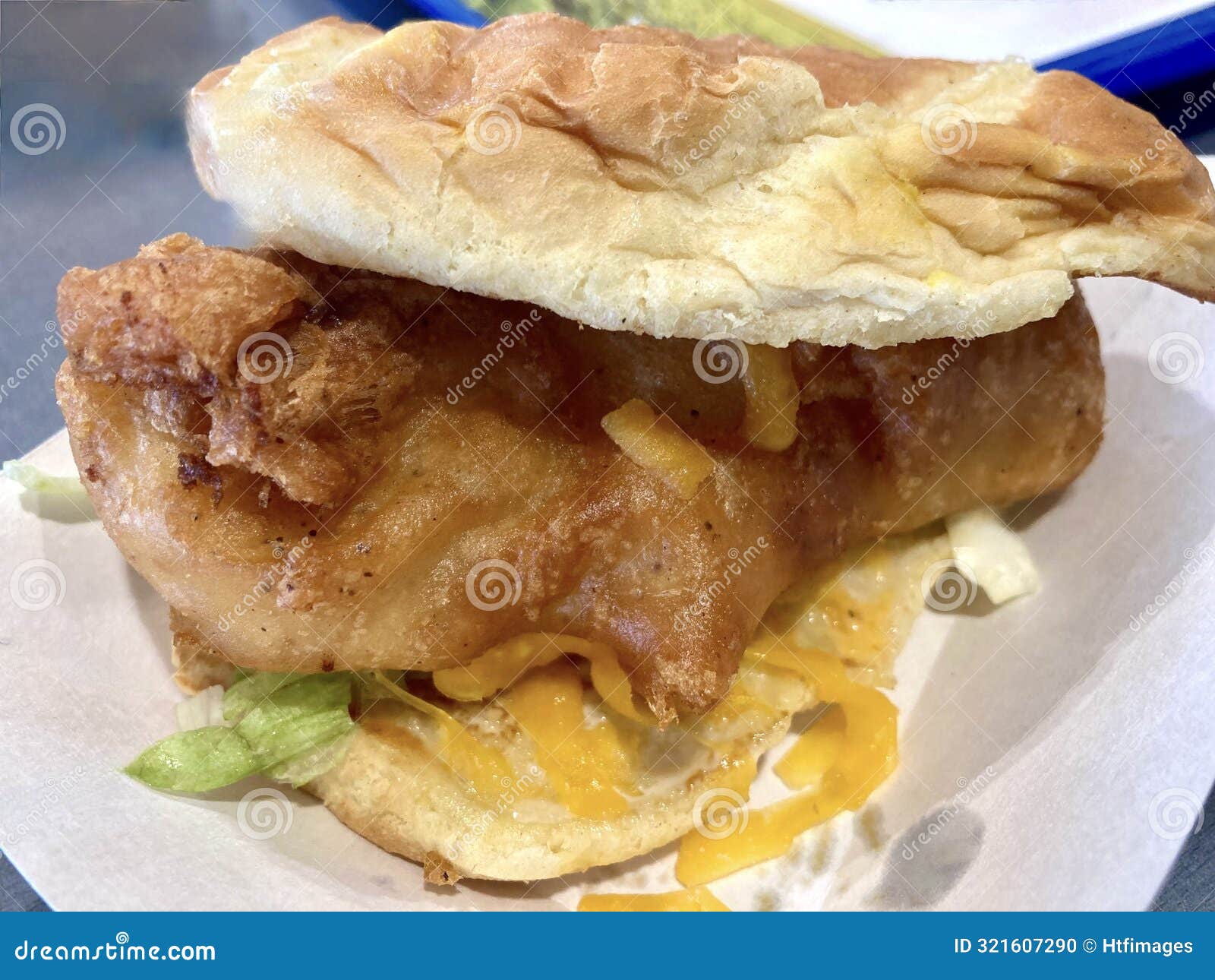 Fried Fish with Cheese on a Roll Stock Photo - Image of breaded ...