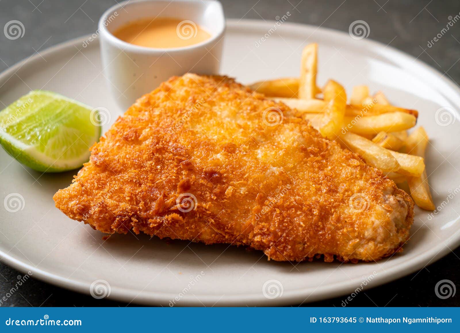 Fried fish and chips stock image. Image of battered - 163793645