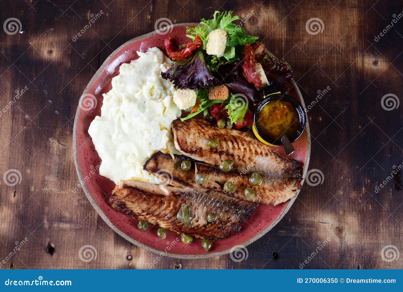 Fried Fish Fillet with Boiled Mashed Potatoes and Salads Stock Photo ...