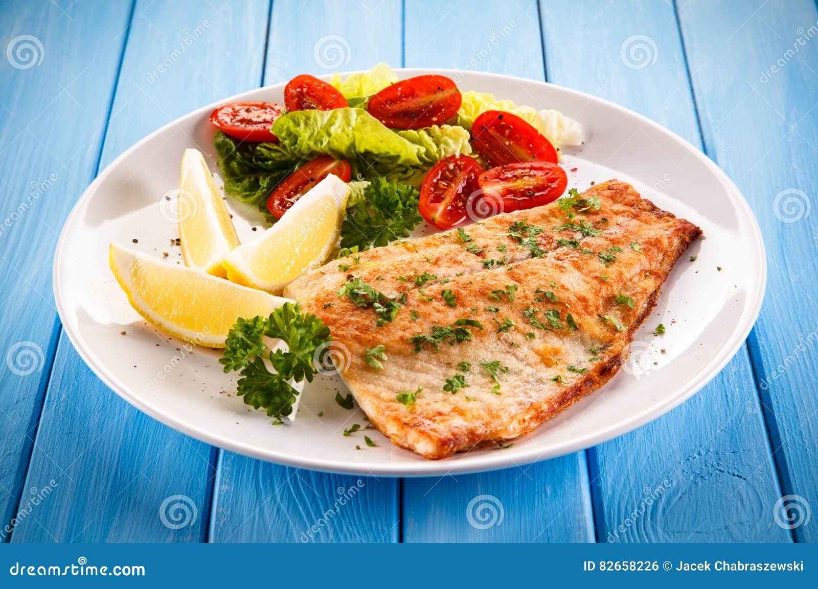 Fried fish fillet stock photo. Image of garnish, cucumber - 82658226