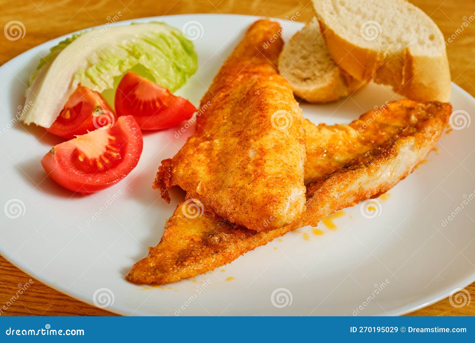 Fried fish fillet on plate stock image. Image of food - 270195029