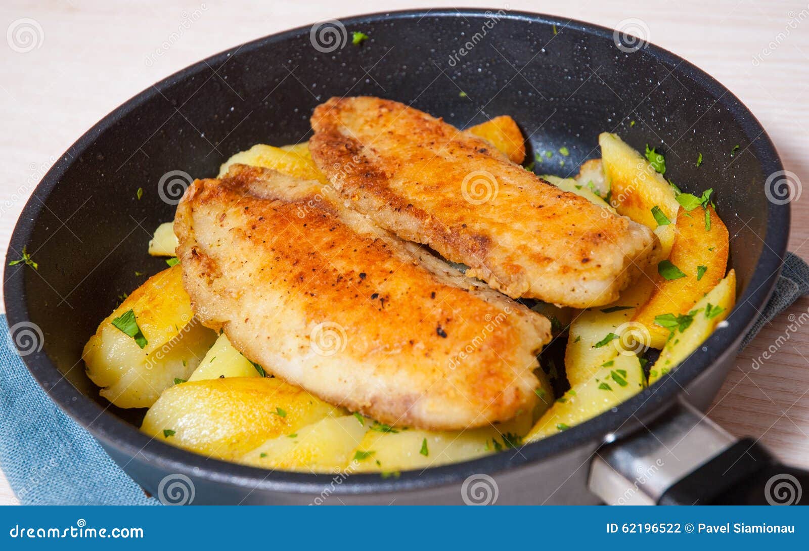 Fried Fish Fillet and Potatoes Stock Photo - Image of baked, iron: 62196522