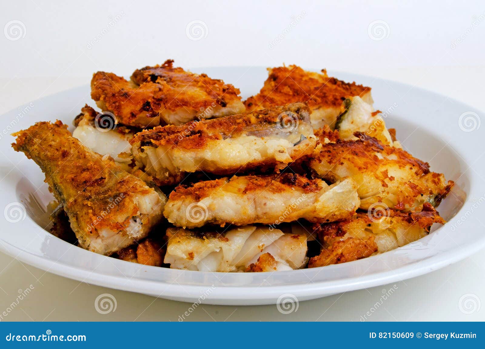 Fried fish in flour. stock image. Image of cholesterol - 82150609